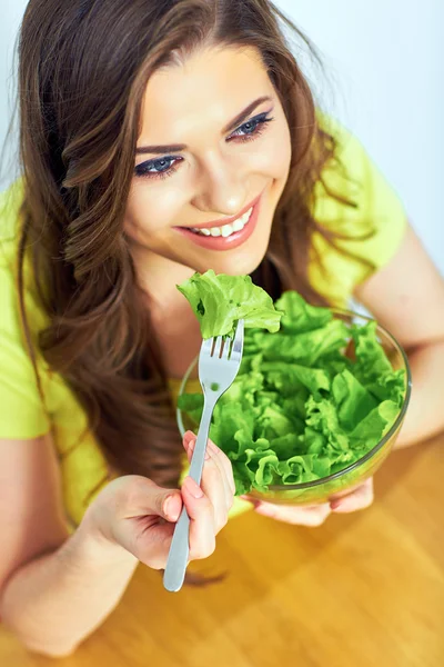 Woman eating salad - Stock Image - Everypixel