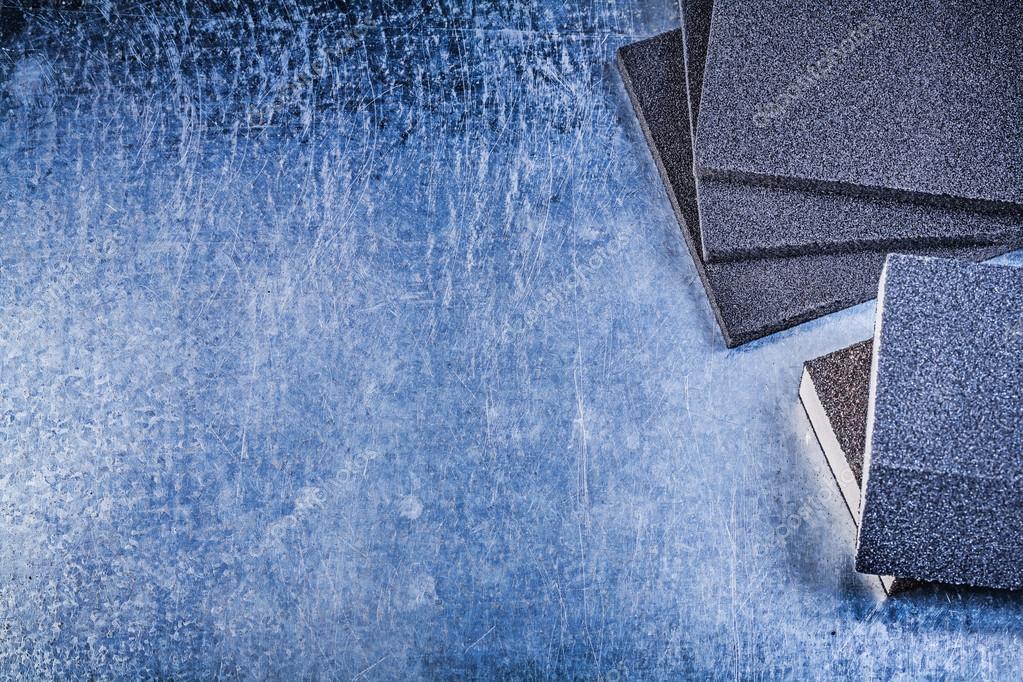 Sanding sponges on scratched metal — Stock Photo © mihalec #102038130