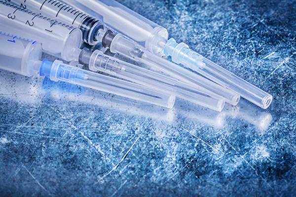 Medical single-use needle injectors Stock Photo by ©mihalec 103607708