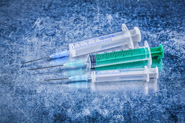 Medical single-use needle injectors Stock Photo by ©mihalec 103607708