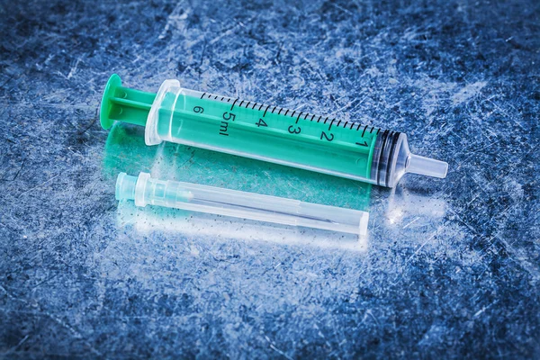 Medical single-use needle injectors Stock Photo by ©mihalec 103607708