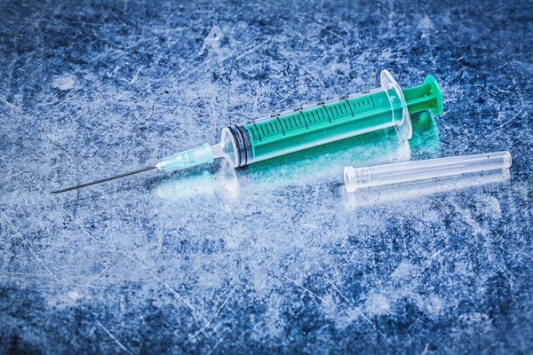 Medical single-use needle injectors Stock Photo by ©mihalec 103607708