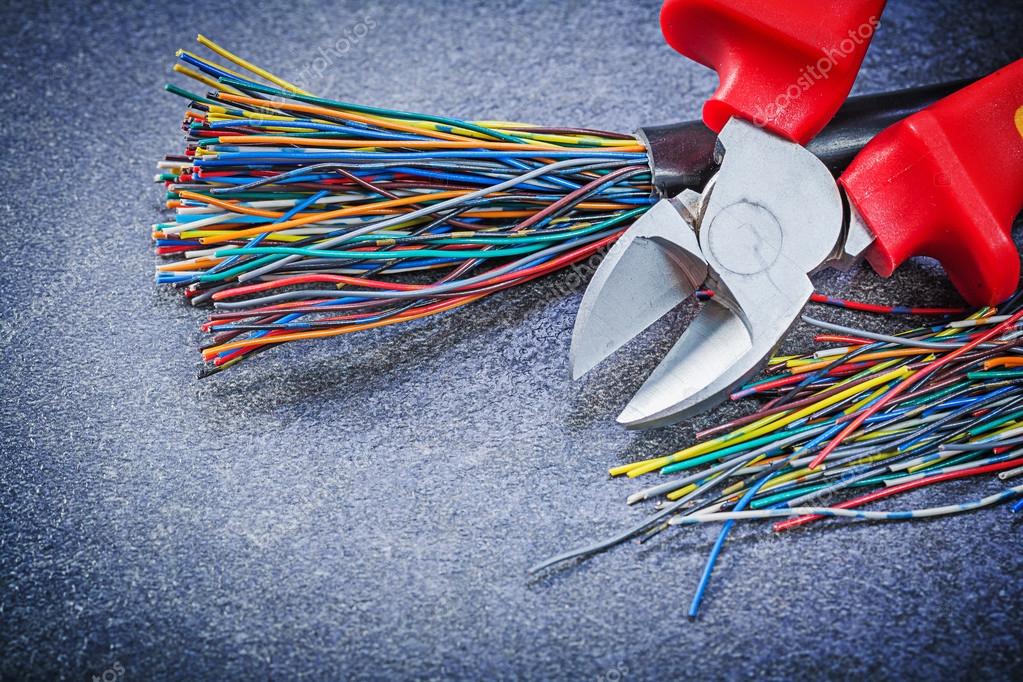 Electrical cables and sharp wire cutter Stock Photo by ©mihalec 105681928