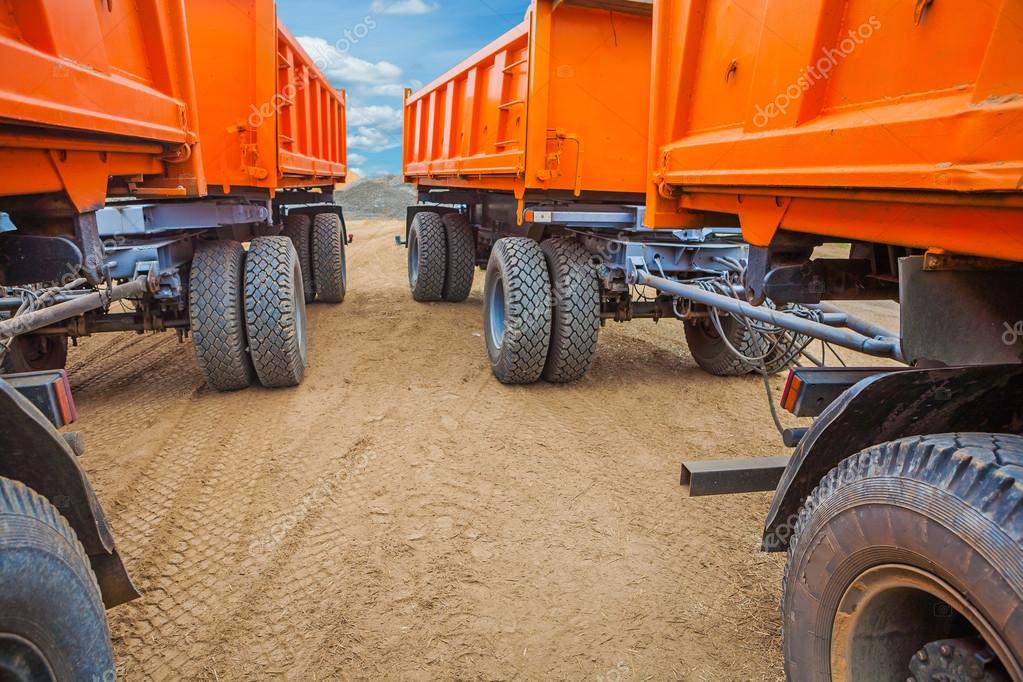Two rows of tippers Stock Photo by ©mihalec 63922085