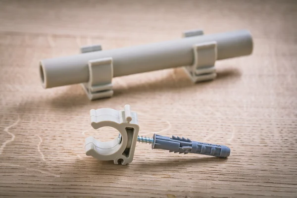 Two Polypropylene Pipe Fixators Stock Photo by ©mihalec 71281649