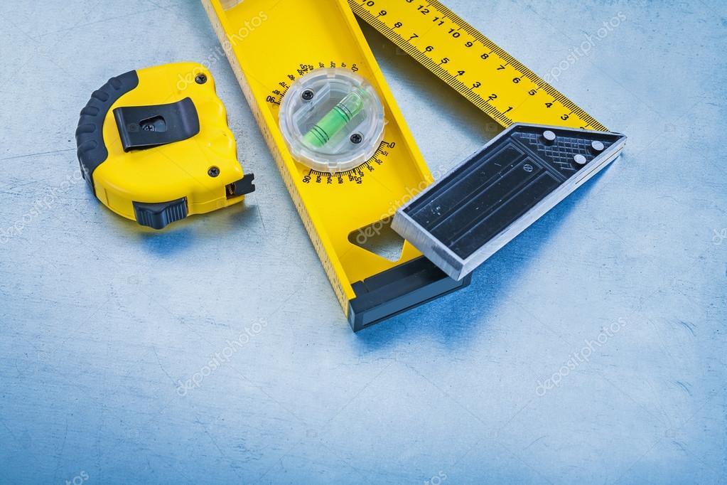 Measuring tape, construction level and ruler Stock Photo by ©mihalec ...