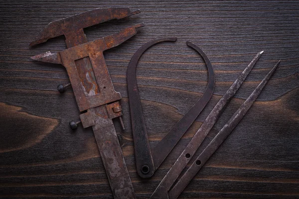 Rusty vernier calipers Stock Photo by ©mihalec 80974972