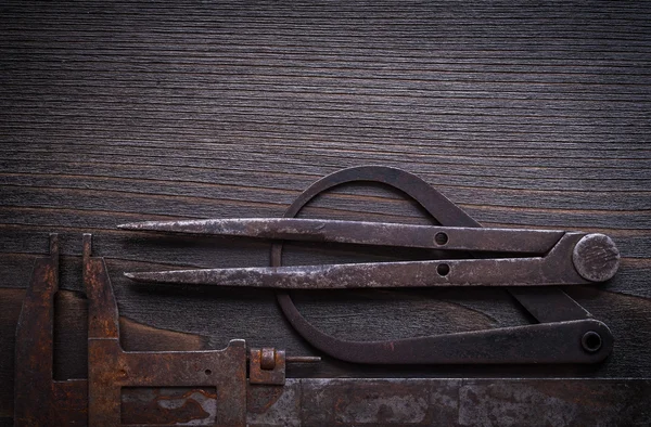 Rusty slide calipers Stock Photo by ©mihalec 80974966