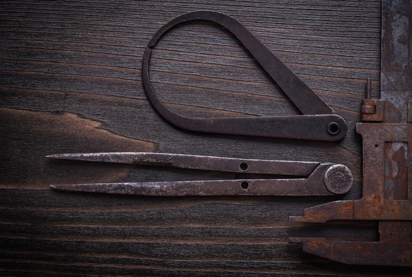Rusty vernier calipers Stock Photo by ©mihalec 80974972