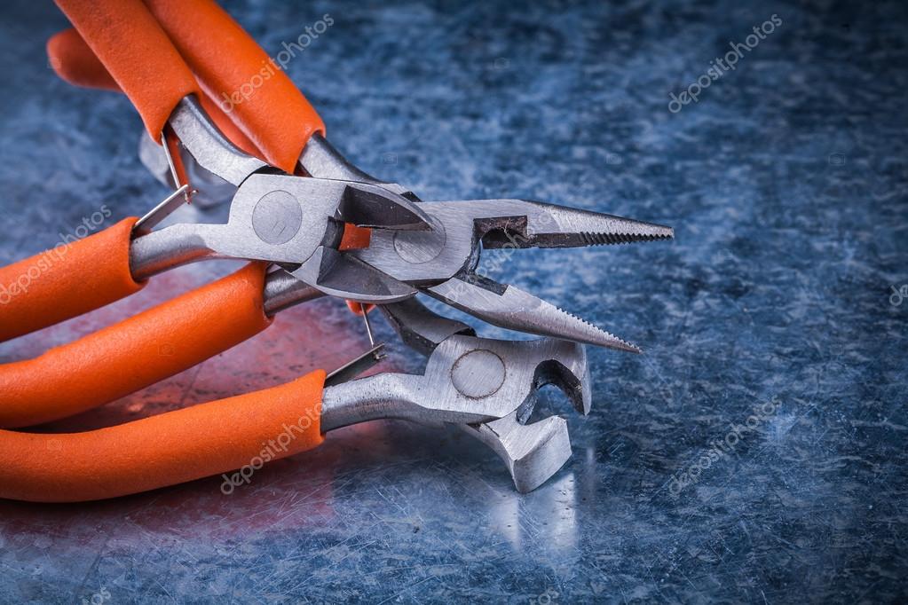 Set of insulated electric pliers nippers — Stock Photo © mihalec #81958502