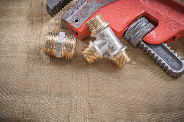 Brass Pipe Connectors And Monkey Wrench Stock Photo by ©mihalec 71281337
