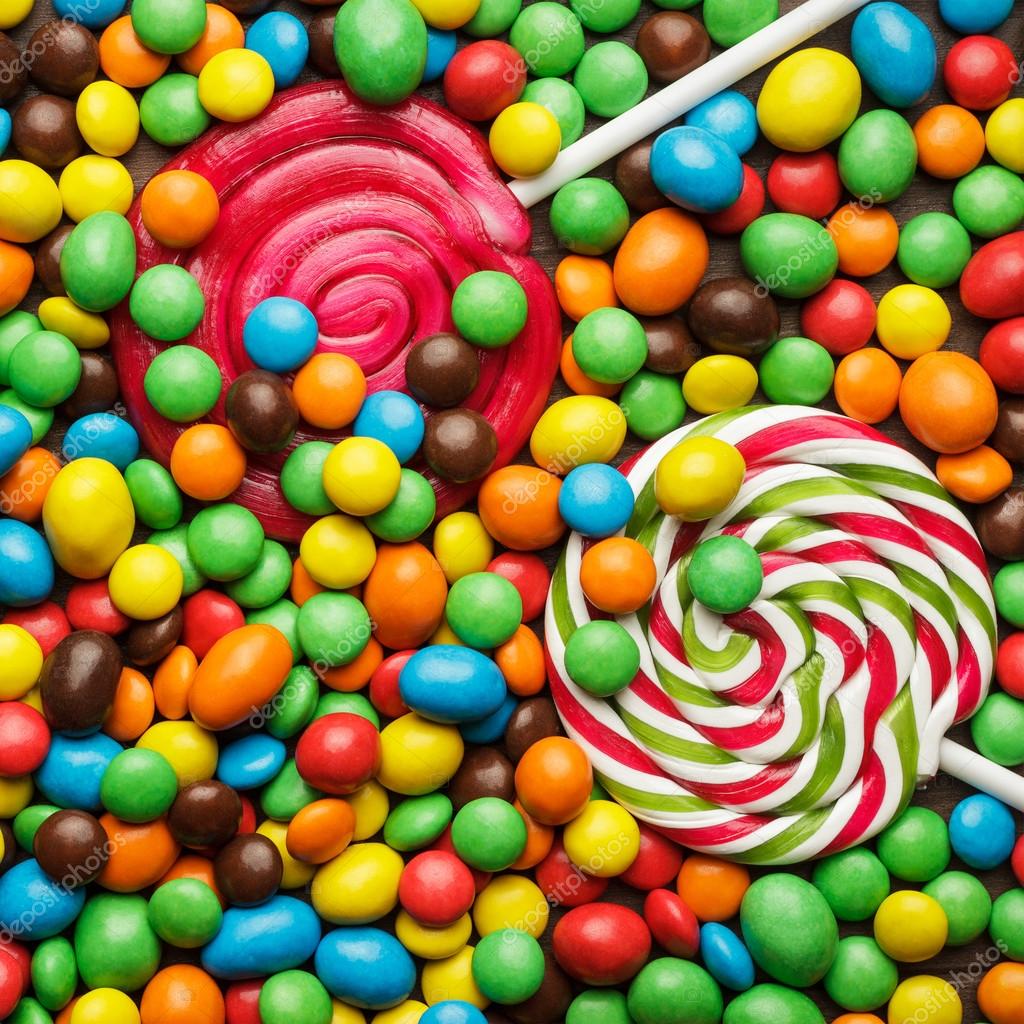 Different colorful sweets and lollipops Stock Photo by ©garloon 85808830