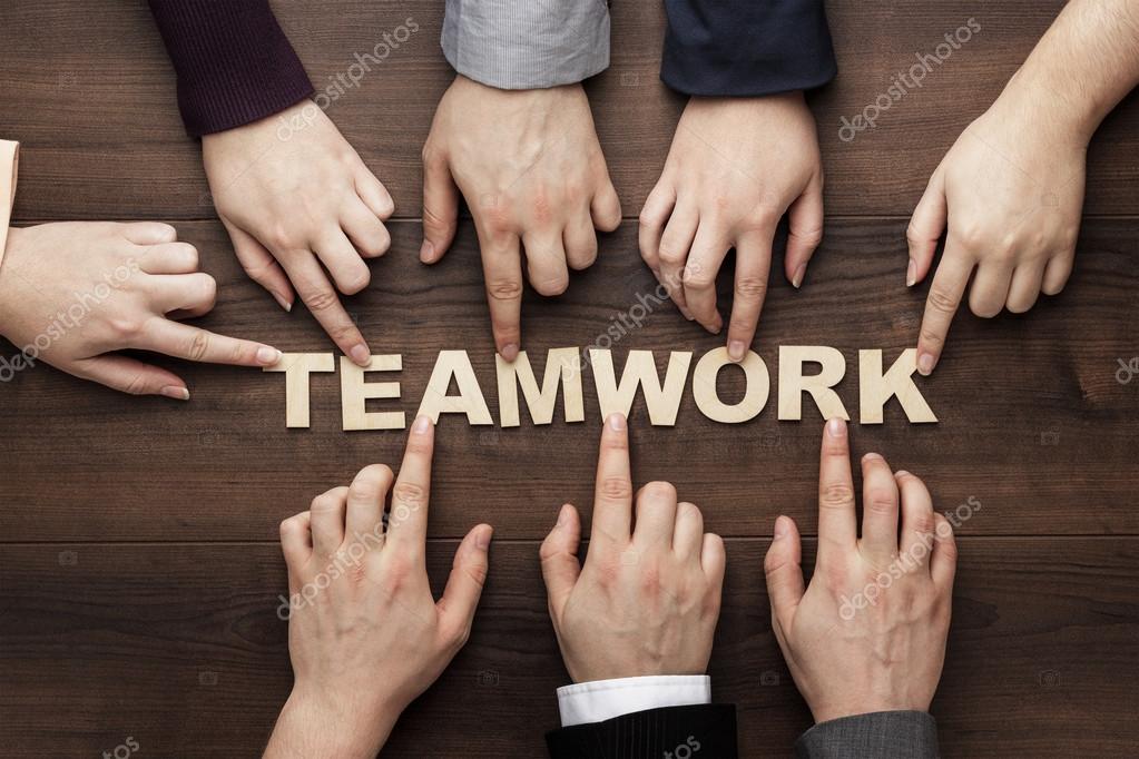 Teamwork concept on the brown wooden table background — Stock Photo ...