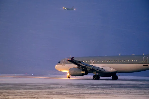 Plane on the runway preparing for take-off - Stock Image - Everypixel