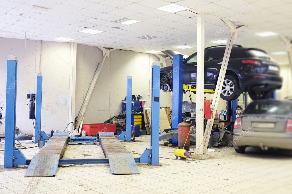 Car repair garage with lift — Stock Editorial Photo © uatp12 #66769085