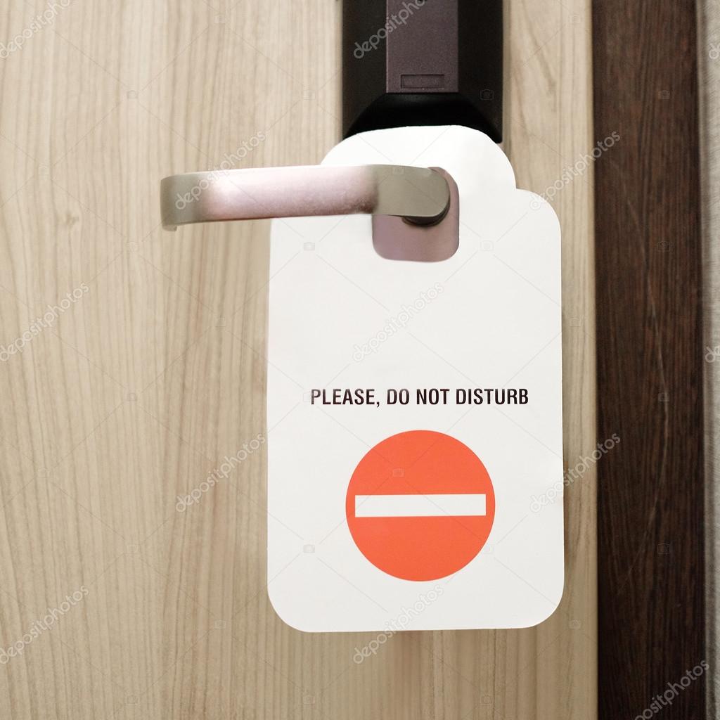 Do not disturb sign hang on door knob — Stock Photo © uatp12 #94156576