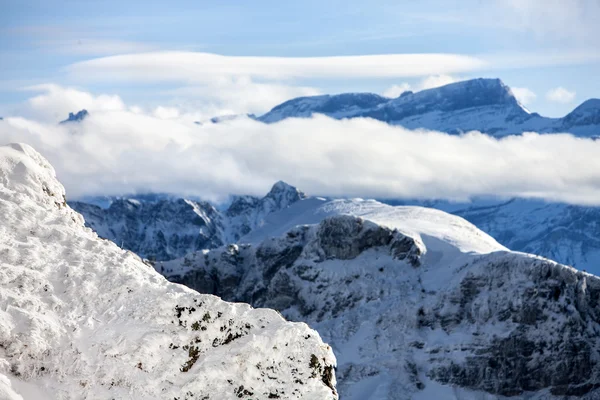 Snowy mountain top Stock Photo by ©poznyakov 59879837
