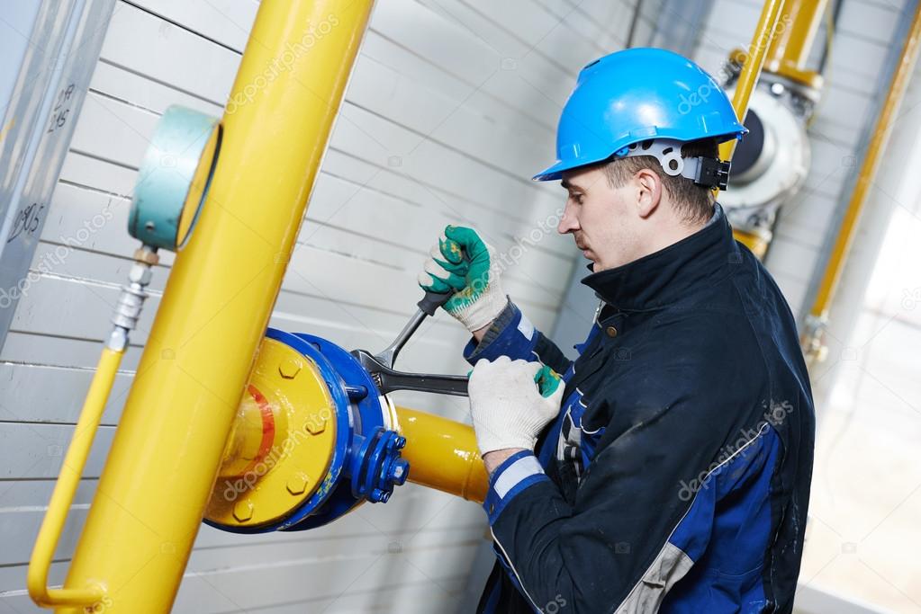 Industrial worker at installation work — Stock Photo © kalinovsky #65397203