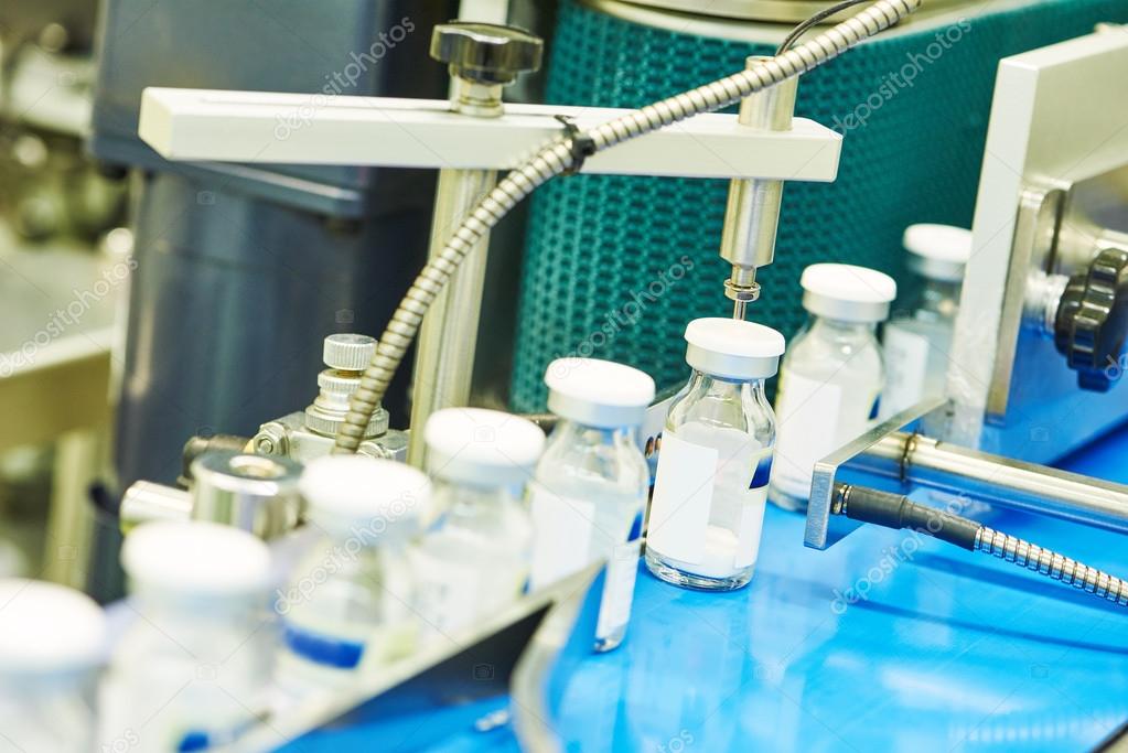 Pharmaceutical production line at factory Stock Photo by ©kalinovsky ...