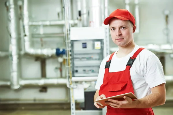 Smiling worker in warehouse — Stock Photo © jukai5 #3628220 Smiling worker in warehouse — Stock Photo © jukai5 #3628220
