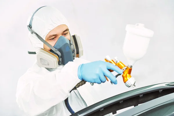 Worker painting auto car body Stock Photo by ©kalinovsky 94164684