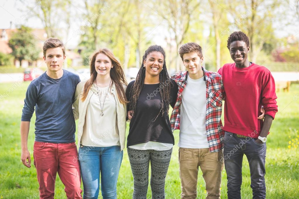 Multiethnic group of teenagers outdoor — Stock Photo © william87 #65620093 Multiethnic group of teenagers outdoor — Stock Photo © william87 #65620093