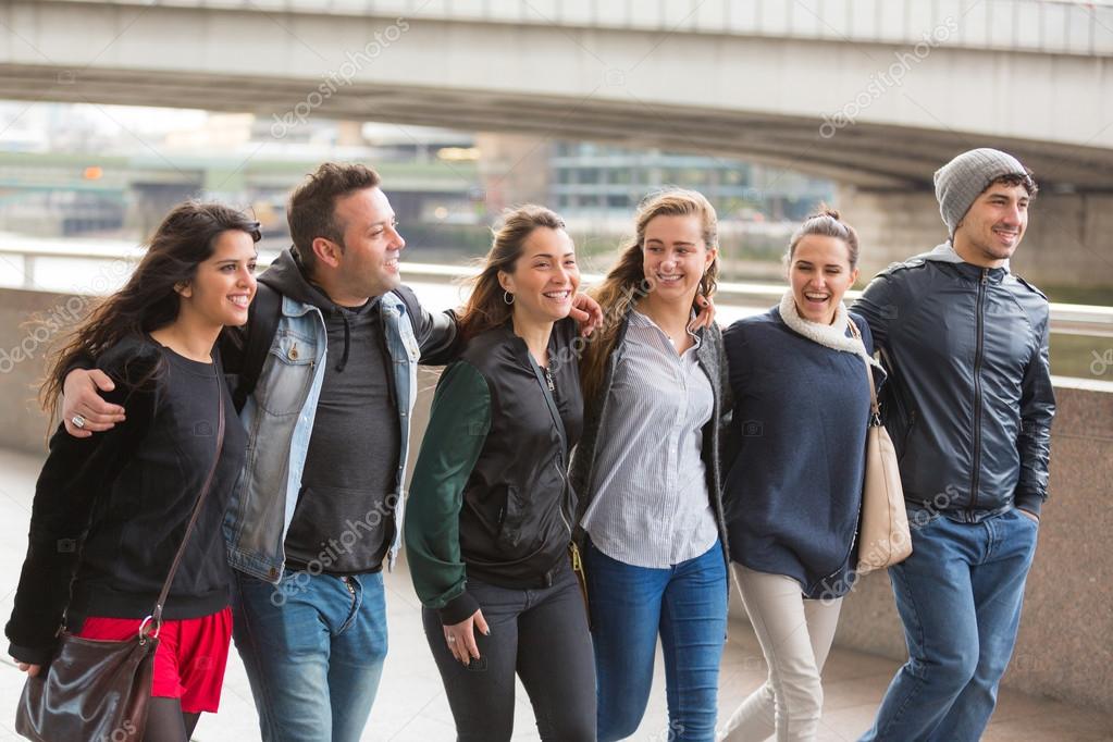 Group of friends walking and having fun together in London — Stock ...