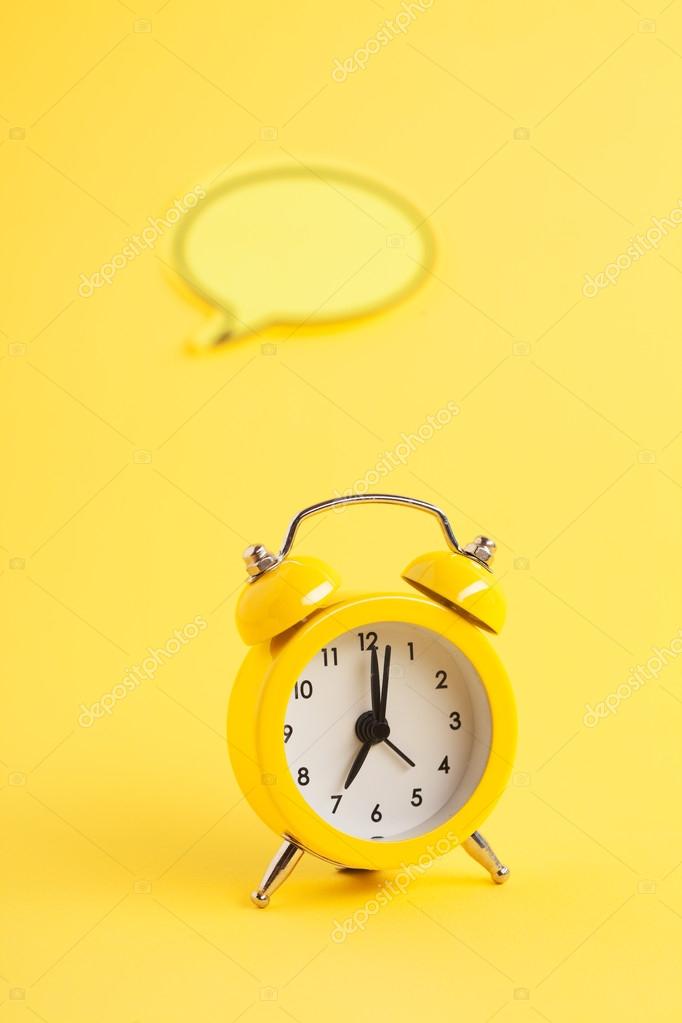 Yellow alarm clock Stock Photo by ©Shebeko 116221180