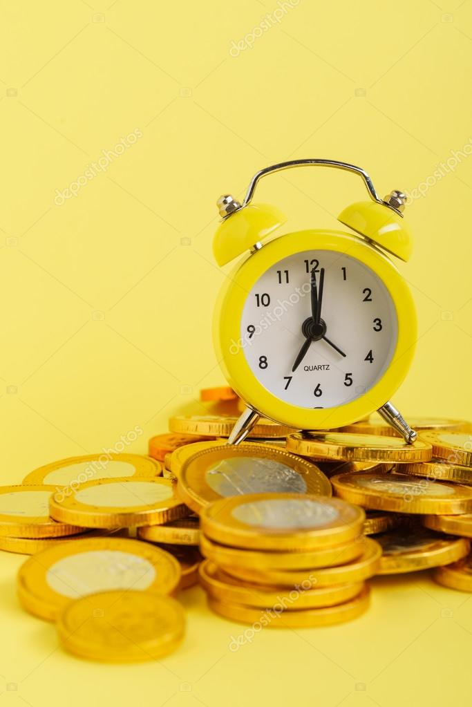 Alarm clock and coins — Stock Photo © Shebeko #122351894