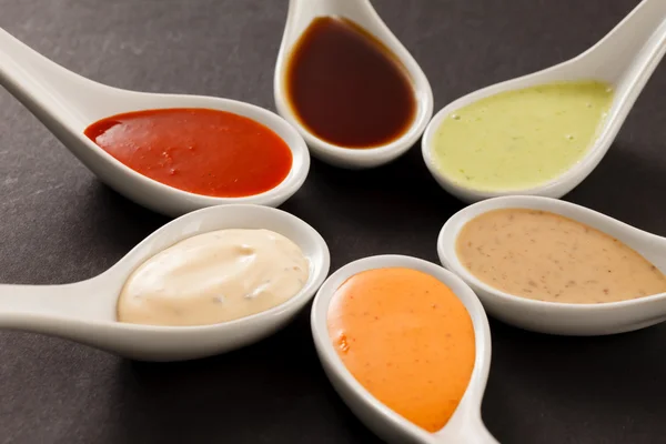Different kinds of sauce Stock Photo by ©Shebeko 54999109