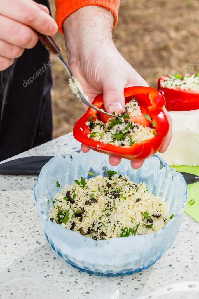 Man stuffing pepper Stock Photo by ©Shebeko 72291997
