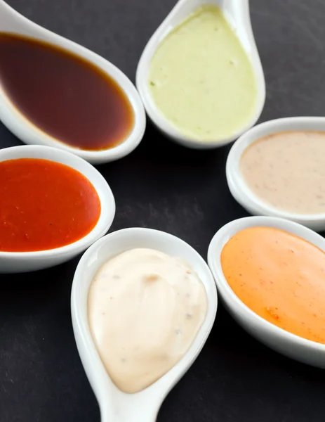 Different kinds of sauce Stock Photo by ©Shebeko 54999109