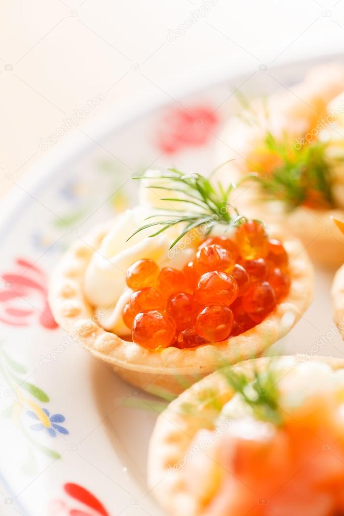 Red caviar canapes Stock Photo by ©Shebeko 87659056