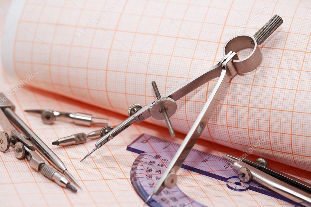 Drawing Instrument On Graph Paper Stock Photo by ©kvkirillov 87917528