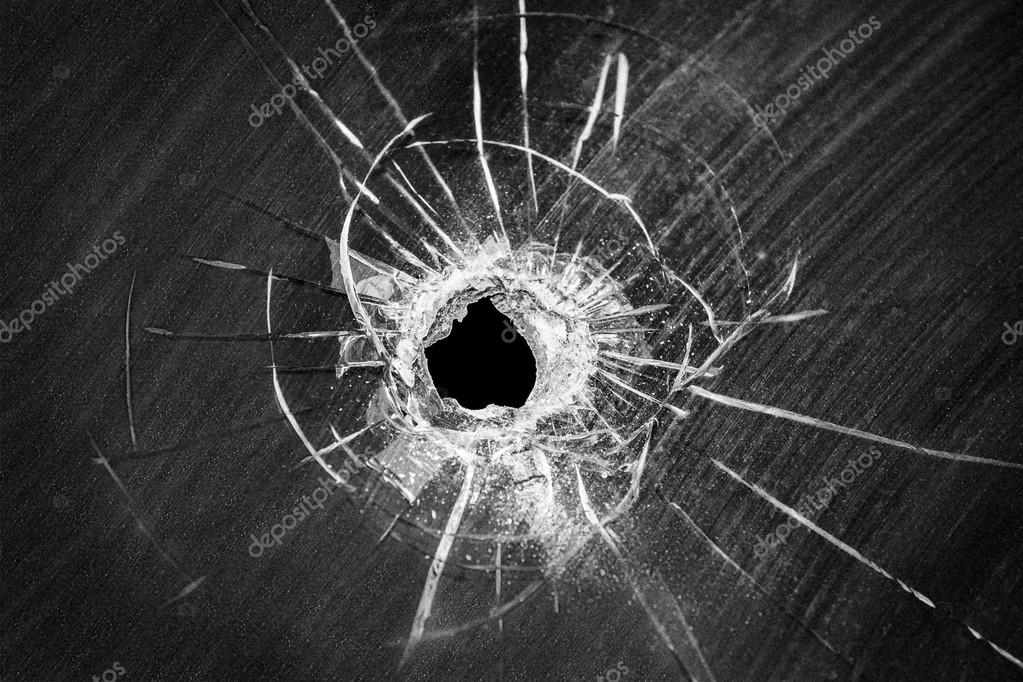Bullet shot cracked hole on broken window glass — Stock Photo © ia__64 ... Bullet shot cracked hole on broken window glass — Stock Photo © ia__64 ...