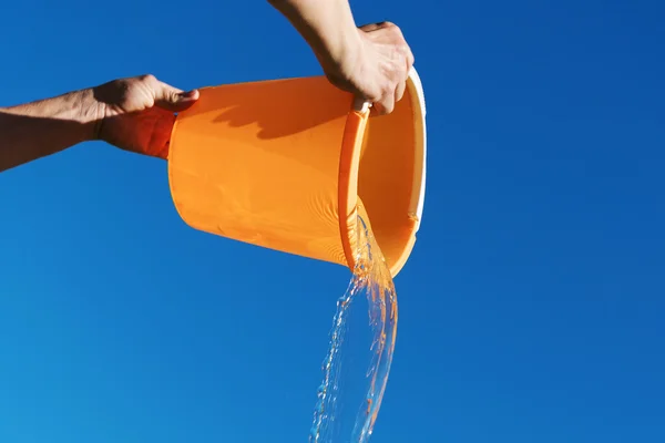 Images: pouring bucket of water | Pouring Water Bucket Blue Sky — Stock ...