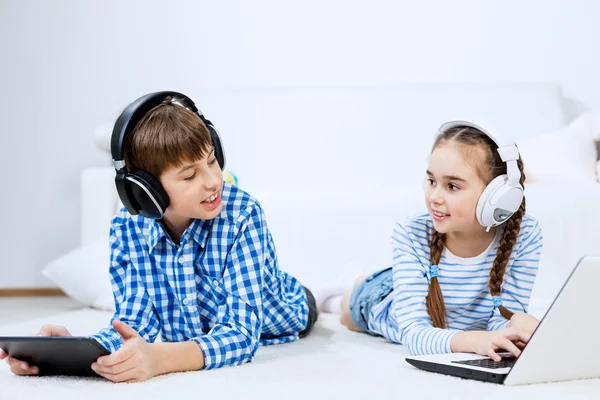 Cute kids using devices Stock Photo by ©SergeyNivens 101243540
