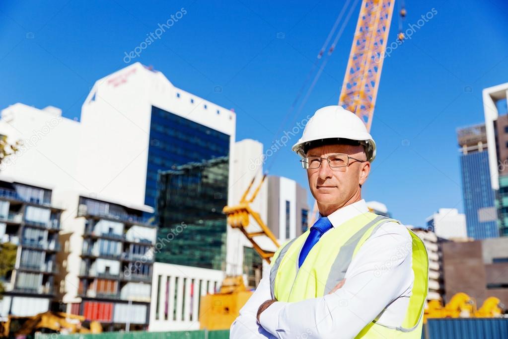 Engineer builder at construction site — Stock Photo © SergeyNivens ...