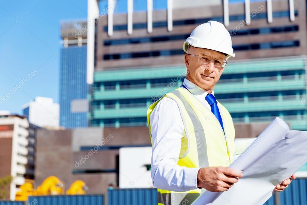 Engineer builder at construction site — Stock Photo © SergeyNivens ...