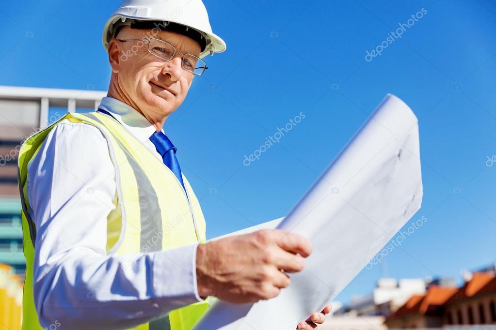 Engineer builder at construction site — Stock Photo © SergeyNivens ...