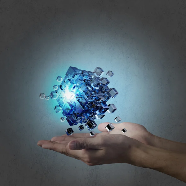 Cube in male hand — Stock Photo © SergeyNivens #103631964