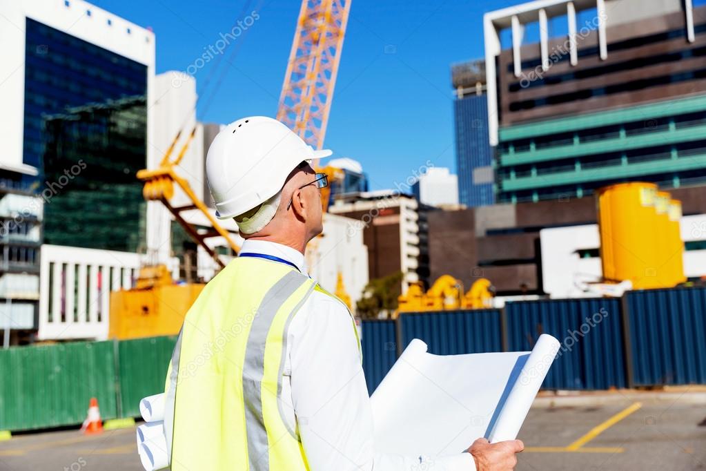 Engineer builder at construction site — Stock Photo © SergeyNivens ...