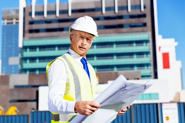 Engineer builder at construction site — Stock Photo © SergeyNivens ...