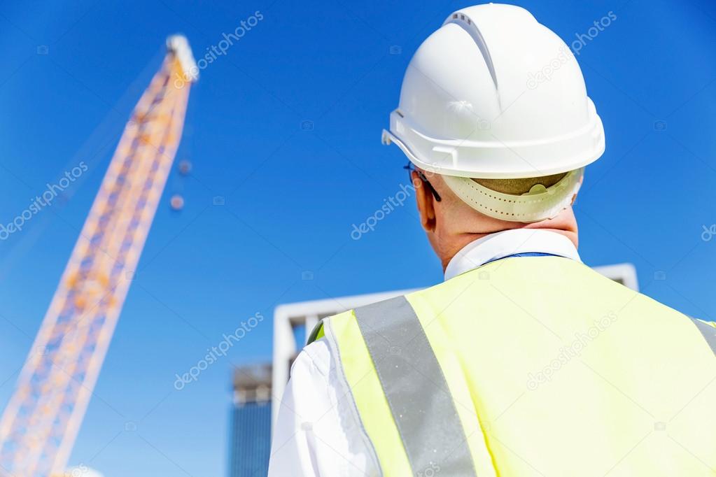 Engineer builder at construction site — Stock Photo © SergeyNivens ...