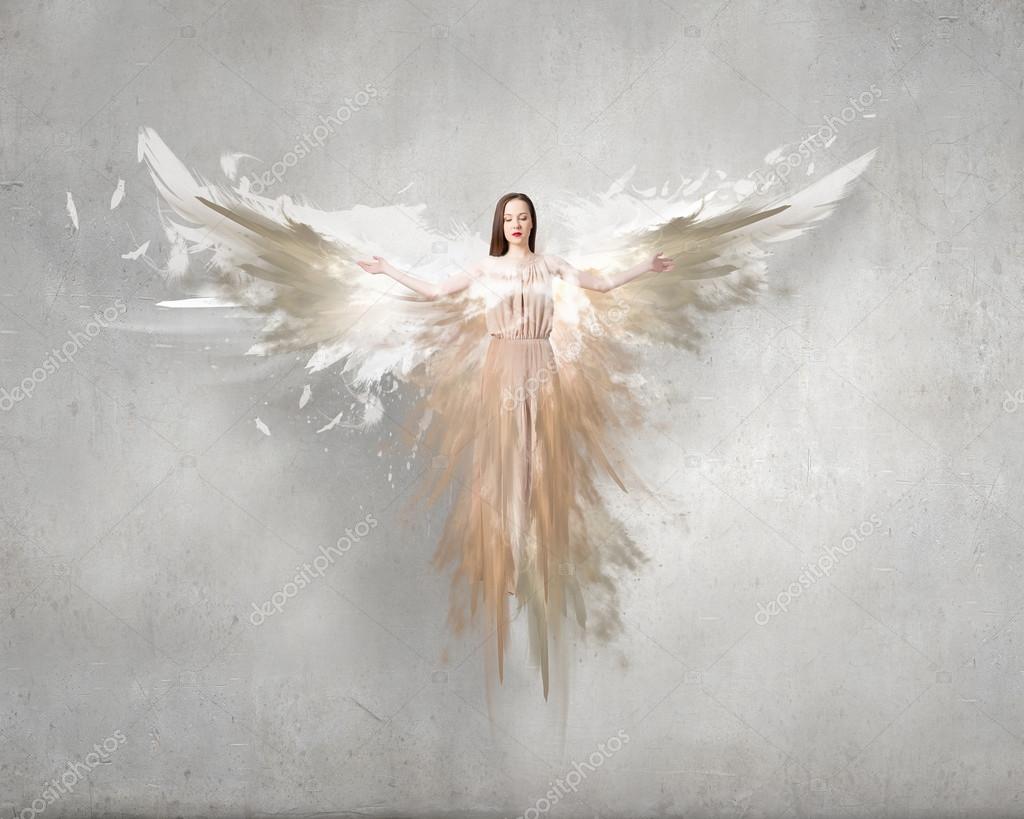 Angelic beautiful woman Stock Photo by ©SergeyNivens 108673490