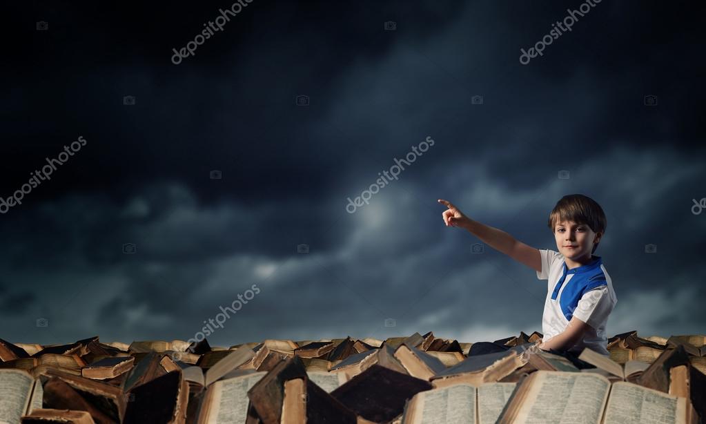 School boy among books — Stock Photo © SergeyNivens #109671338