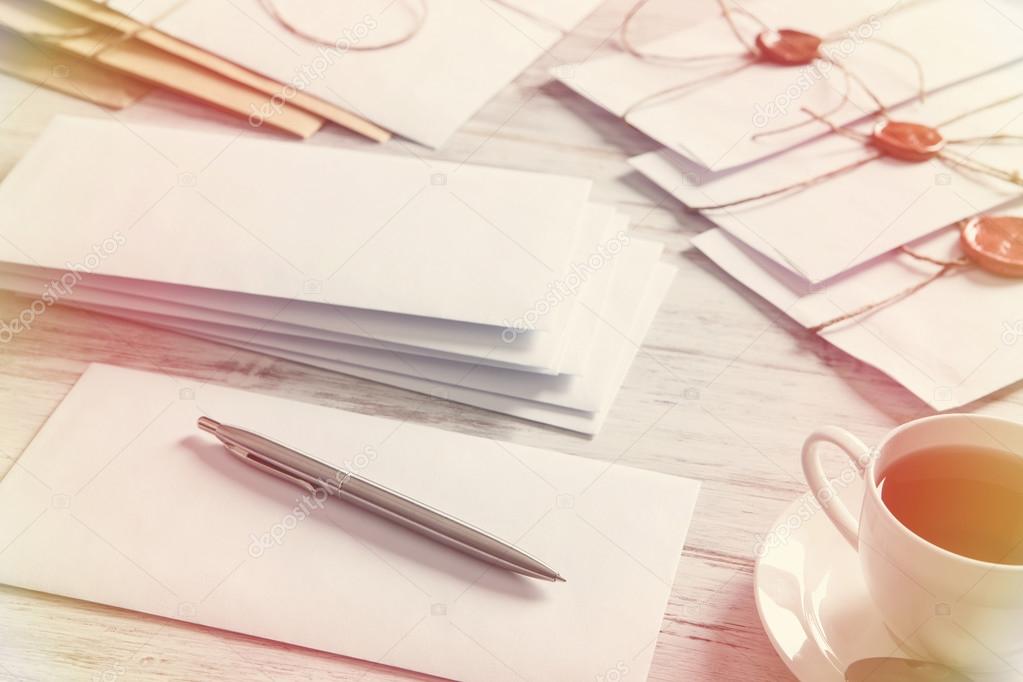 Letters with seal on table Stock Photo by ©SergeyNivens 119051424