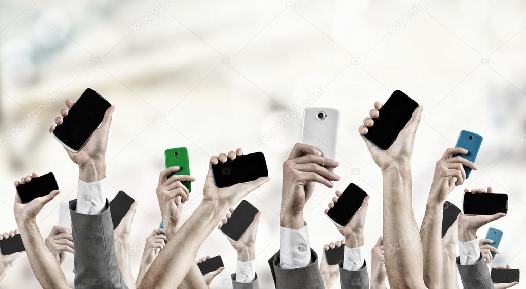 Crowd of people with phone in hands Stock Photo by ©SergeyNivens 119437698