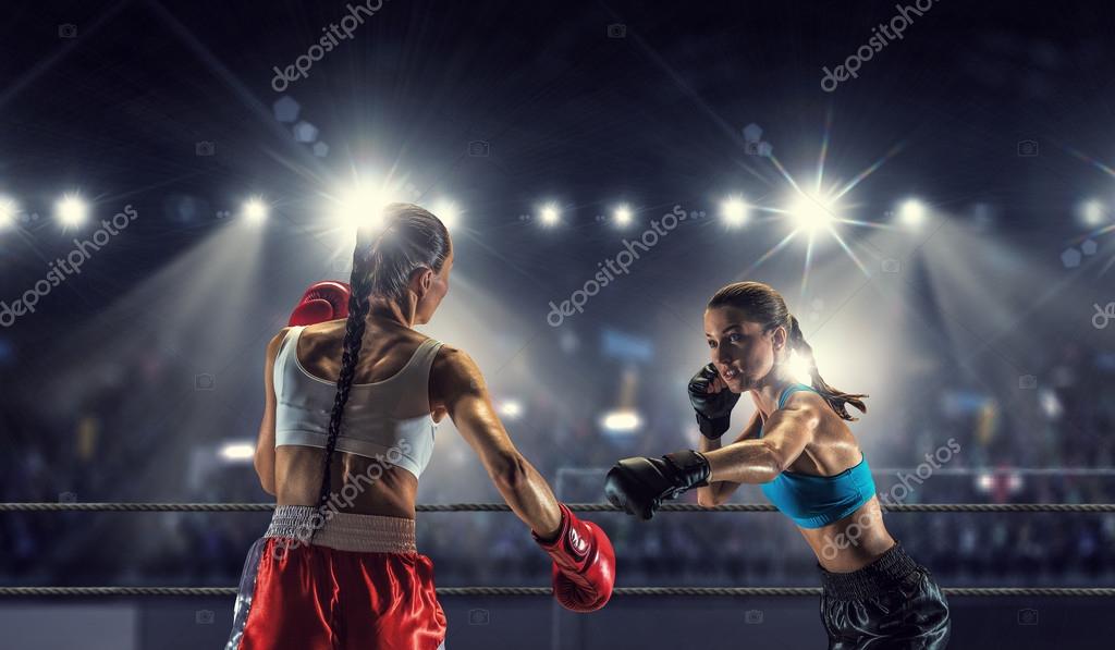 Girls boxing in ring . Mixed media — Stock Photo © SergeyNivens #120448618
