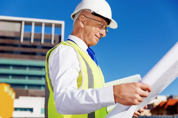 Engineer builder at construction site — Stock Photo © SergeyNivens ...